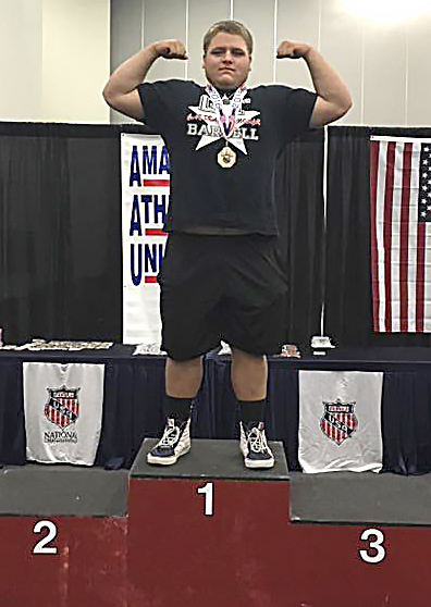 PNG grad sets bench press world record | Port Arthur News