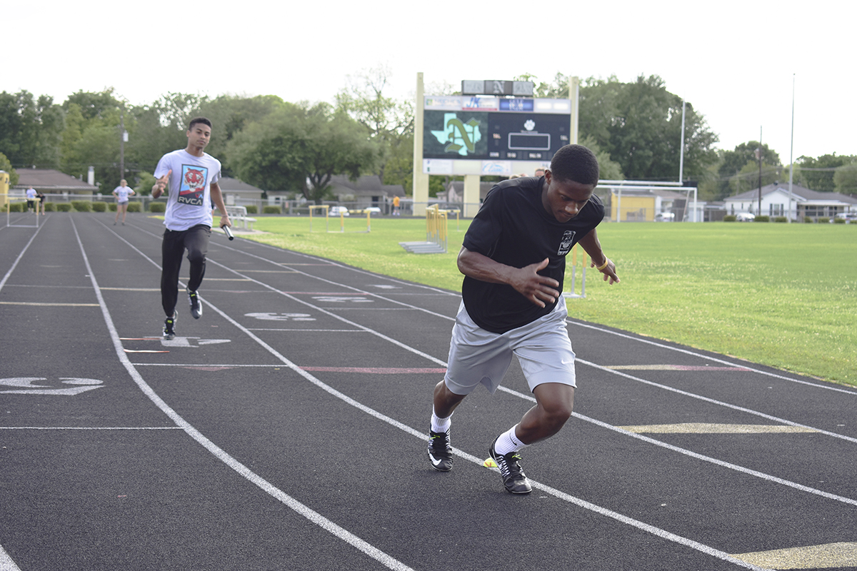 TRACK AND FIELD: Black-and-gold standard: Nederland relay team sets ...