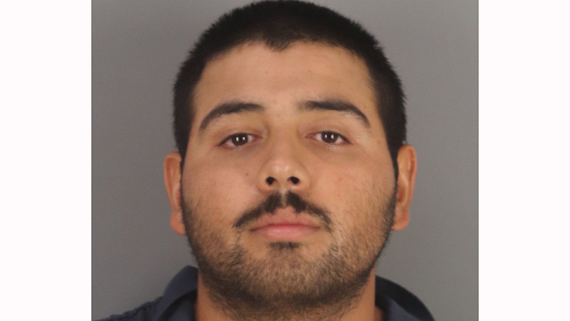 Document: Man jamming in flipped truck pointed gun at officer | Port ...