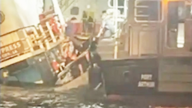 Crewmen cut hole in capsizing tug Friday morning to save fellow crew ...