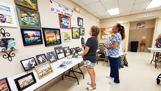 Local artist Doug Jackson delivers paintings, inspiration to senior ...