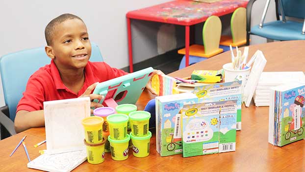 Mildred Yount Manion provides electronic tablets, individual art ...